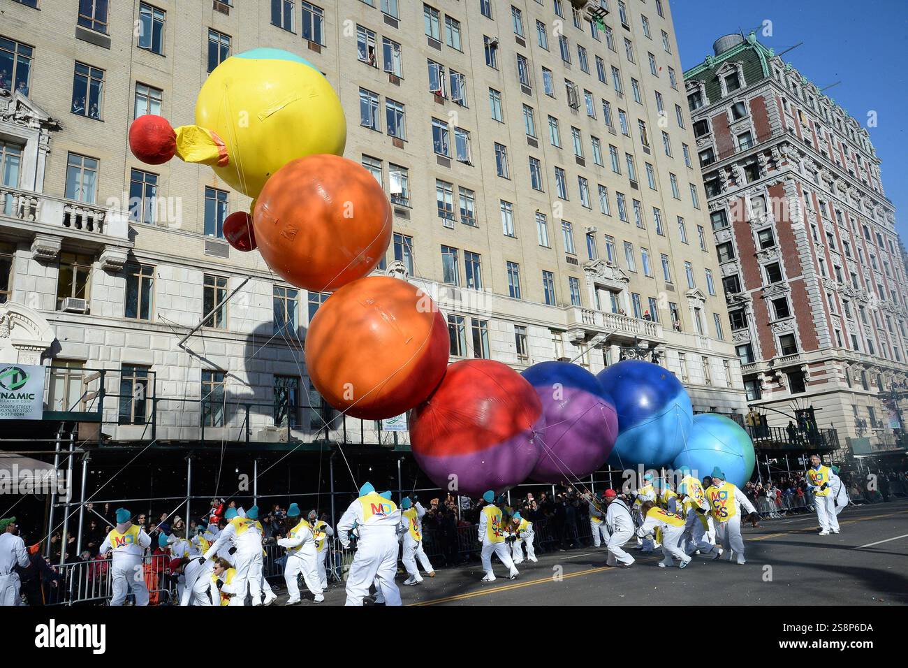 Handlers struggle with the Caterpillar balloon at the 93rd Annual Macy ...