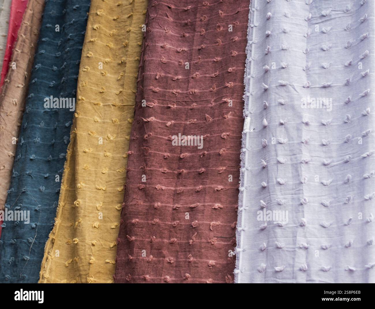 Examples of colorful fabric of various color and type Stock Photo - Alamy