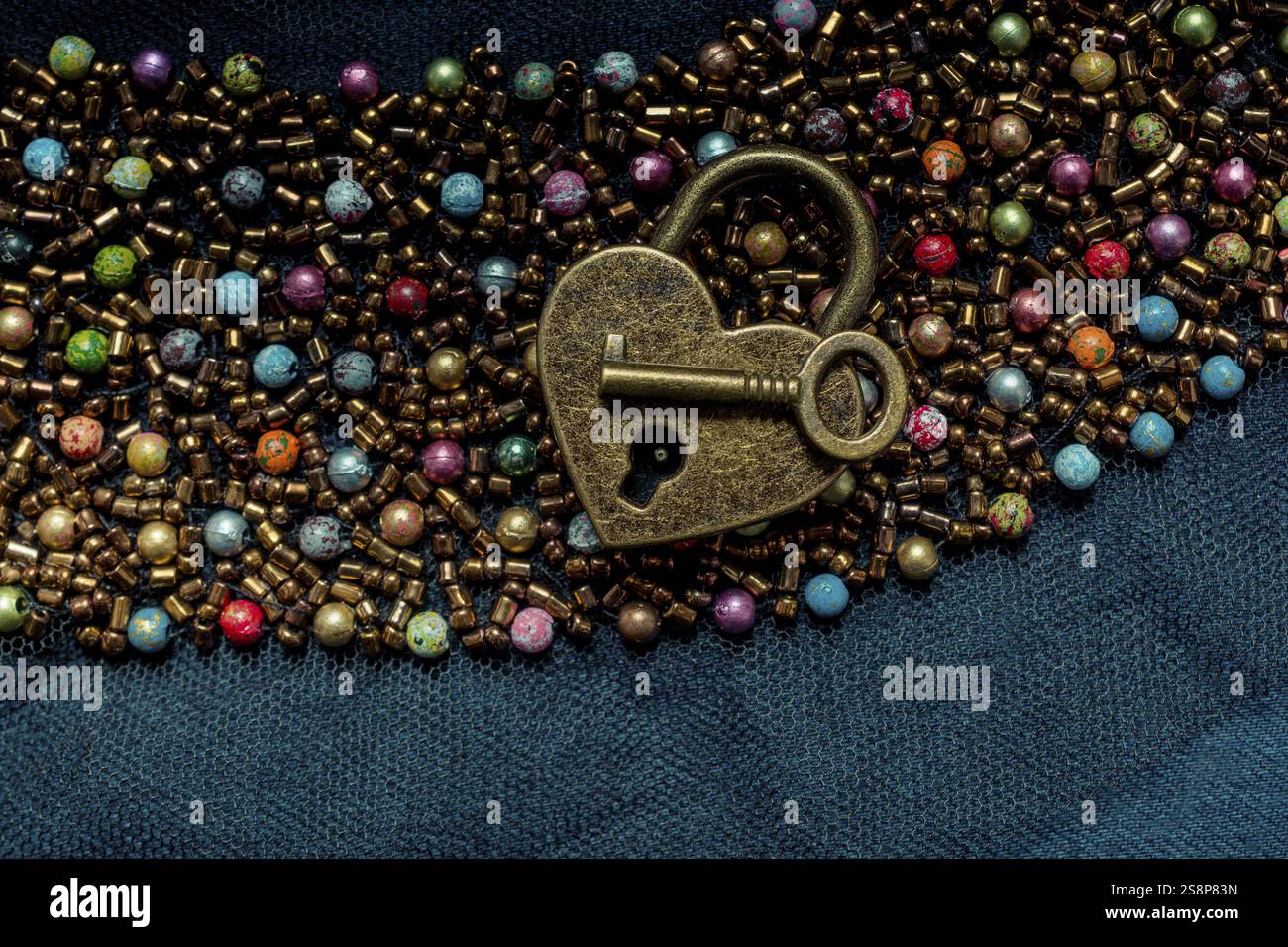 Heart shaped lock and key on an abstract background Stock Photo - Alamy