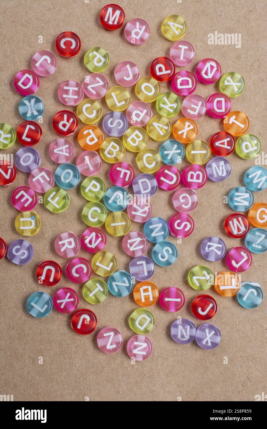 Colorful abc alphabet letter beads scattered . Education concept Stock ...