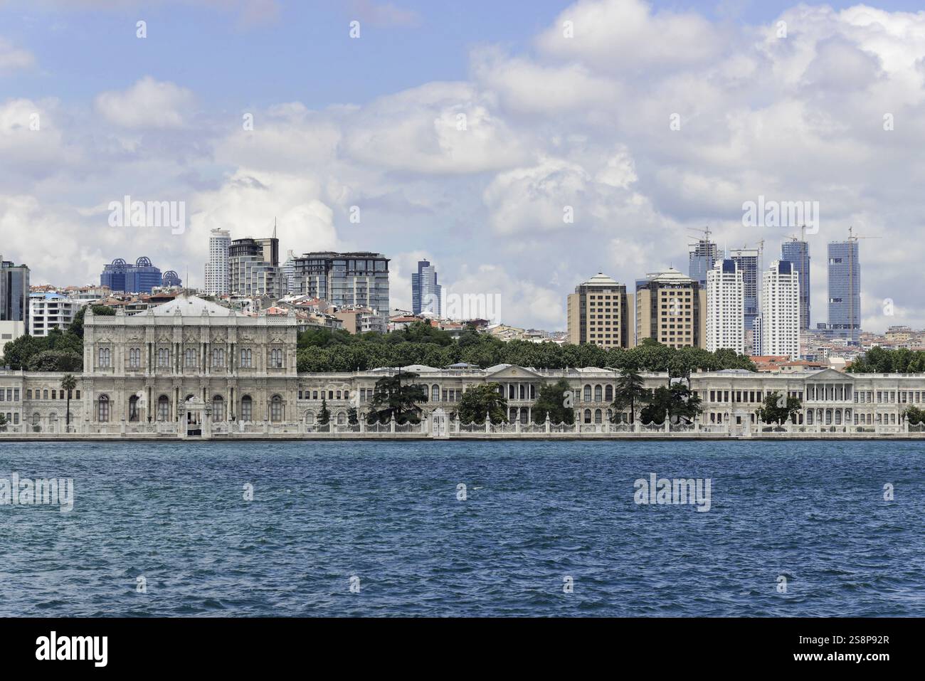 Historic palace on the waterfront with modern skyscrapers in the ...