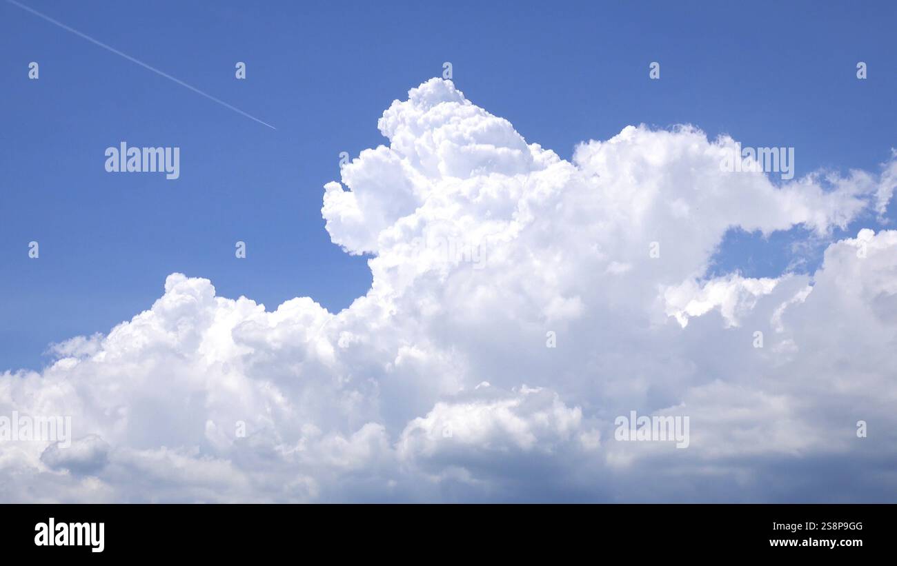 An image of a Cumulus congestus pileus cloud background Stock Photo - Alamy
