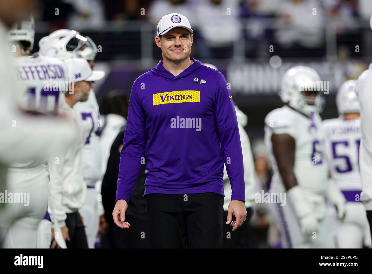 FILE - Minnesota Vikings head coach Kevin O'Connell walks across the ...