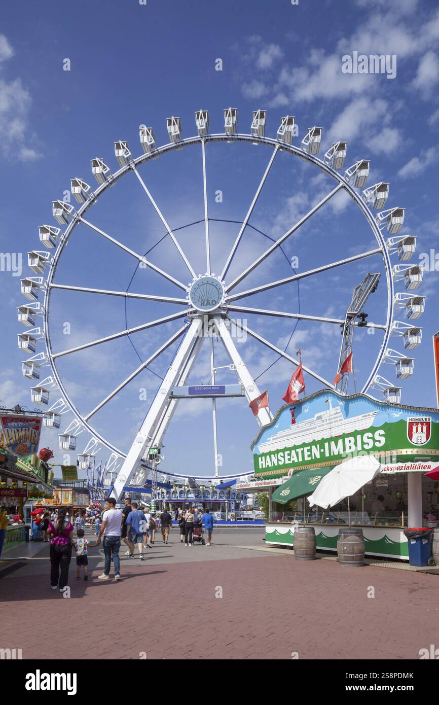 Ferris wheel with stalls and snacks at the Hamburger Dom fair on the ...