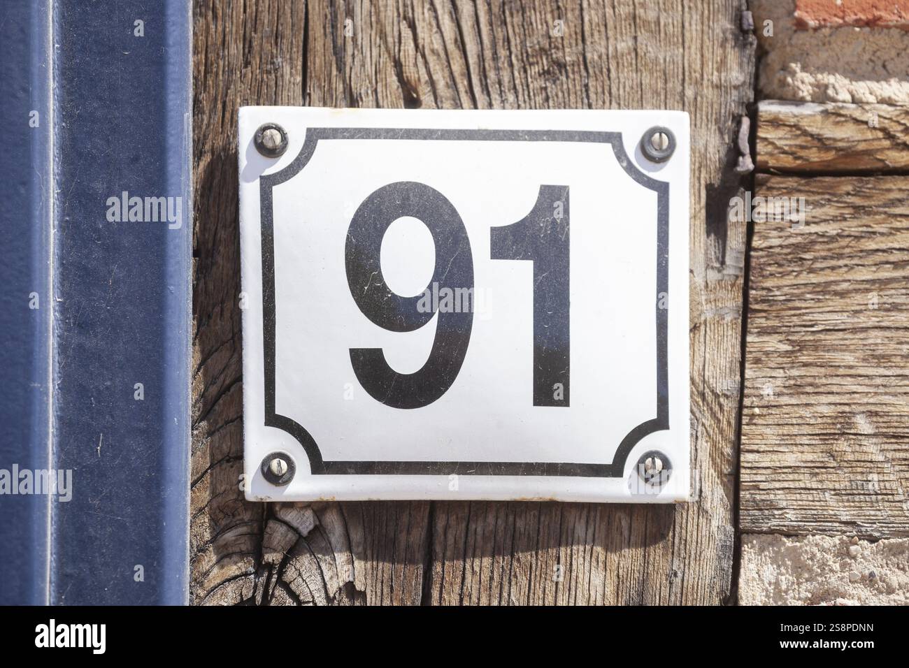 House number plate number 91 on an old half-timbered beam, Old Town ...