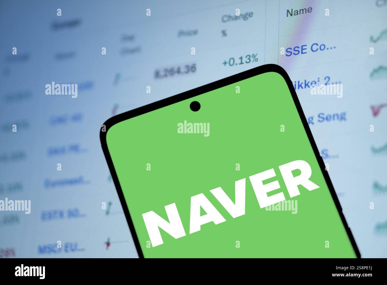 Naver logo is displayed on smartphone. Naver Corporation is a South ...