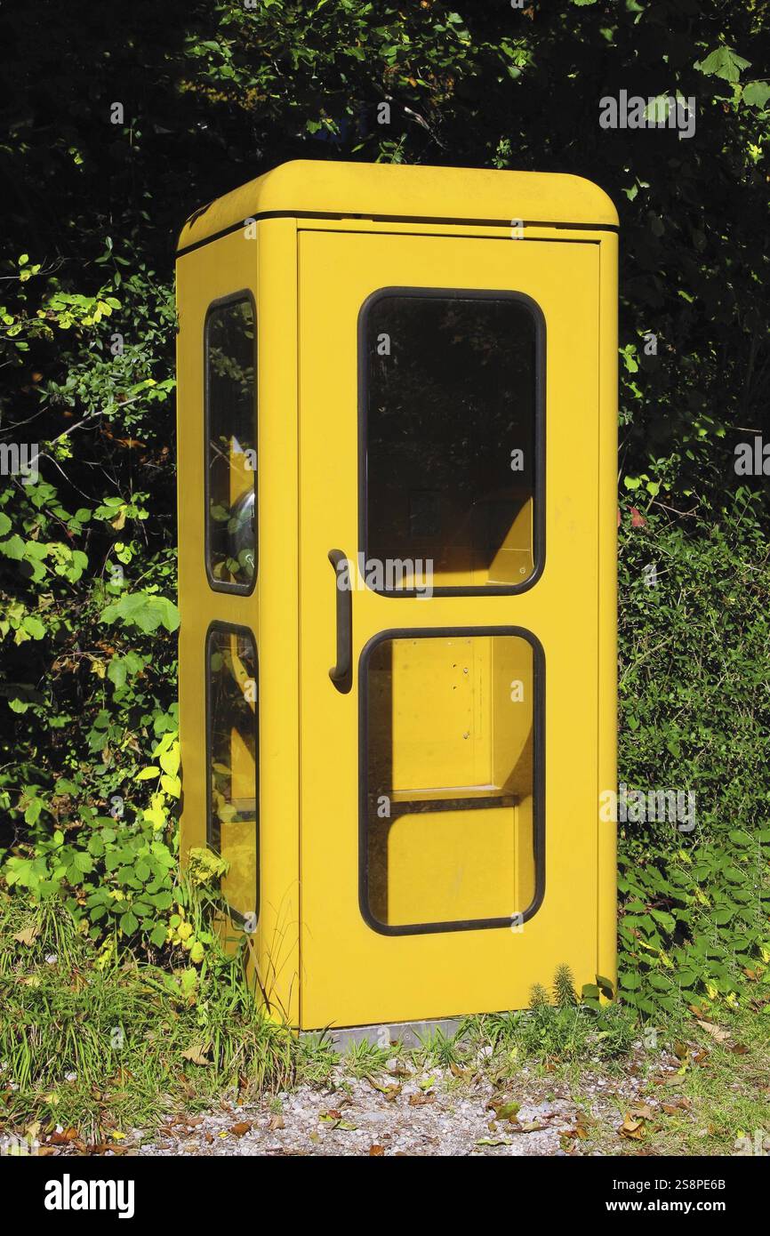 An image of a vintage yellow german phone box Stock Photo - Alamy