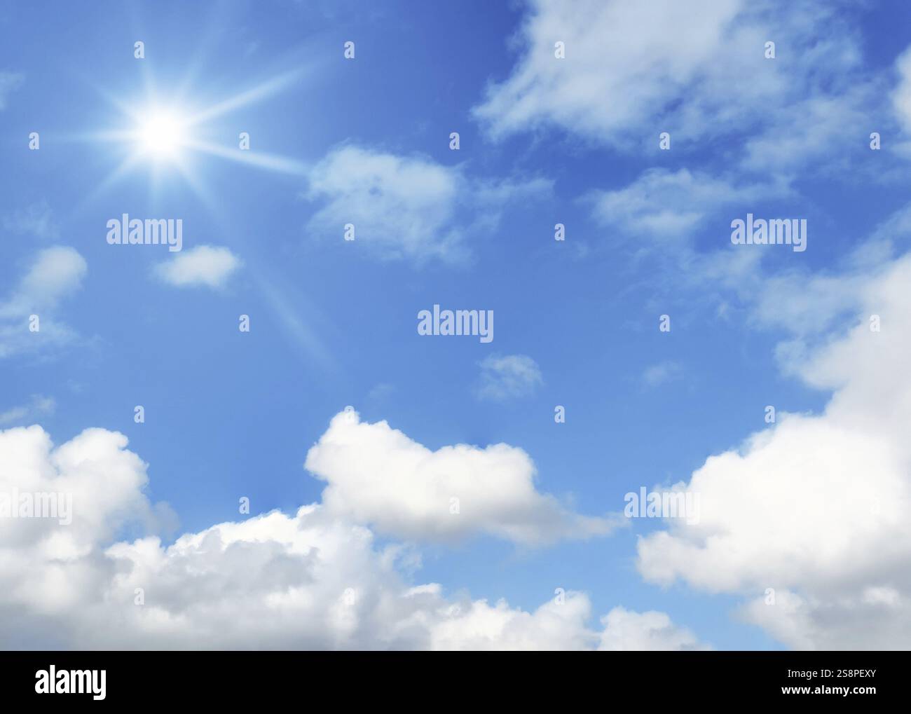 An image of a typical blue sky with sun and clouds background Stock ...