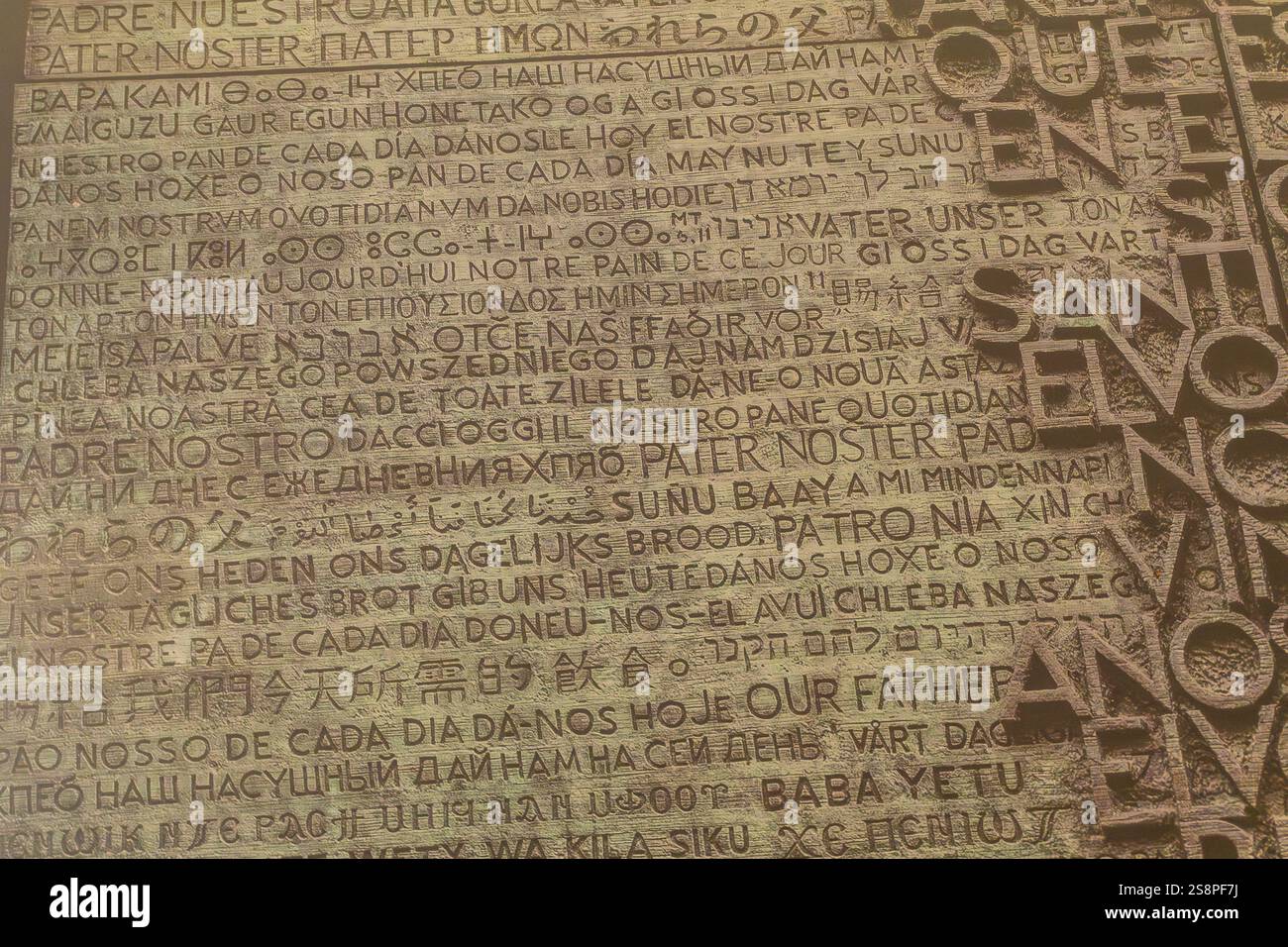 Lord's prayer written in many different languages, creating a spiritual and multicultural ...