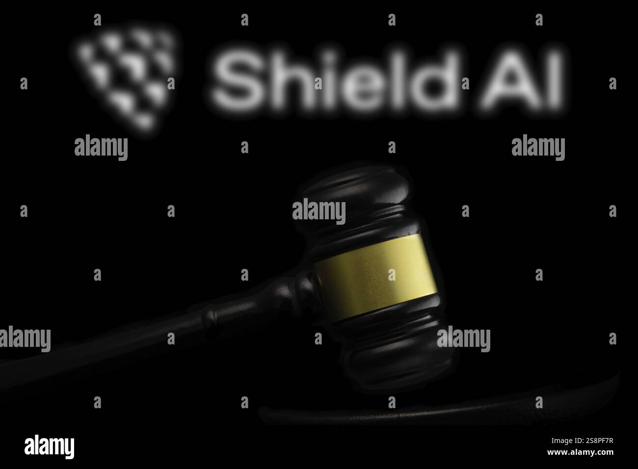 Court gavel in front of the Shield ai logo. Shield AI is an American ...