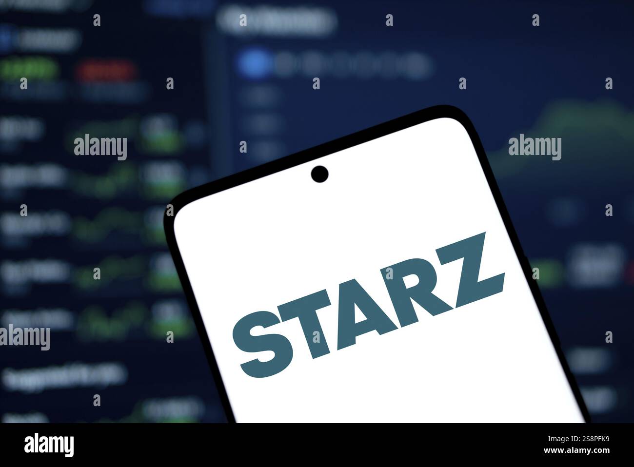 Starz logo is displayed on smartphone. STARZ is an American pay ...