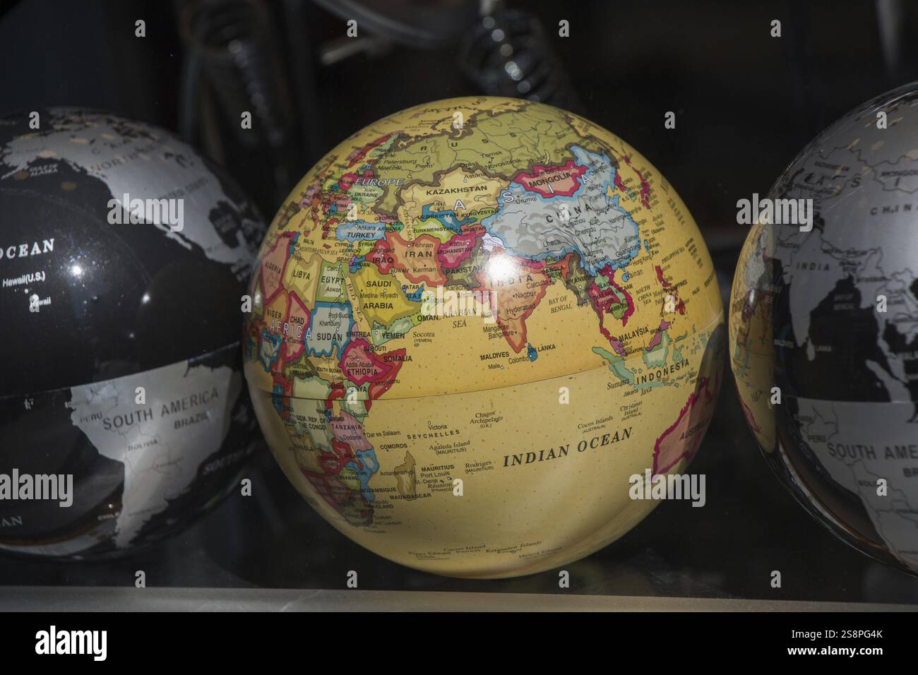 Set of globes of various types in view Stock Photo - Alamy