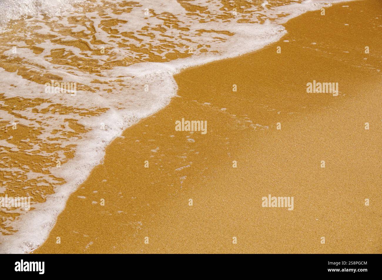 An image of a sandy beach shore line texture background Stock Photo - Alamy