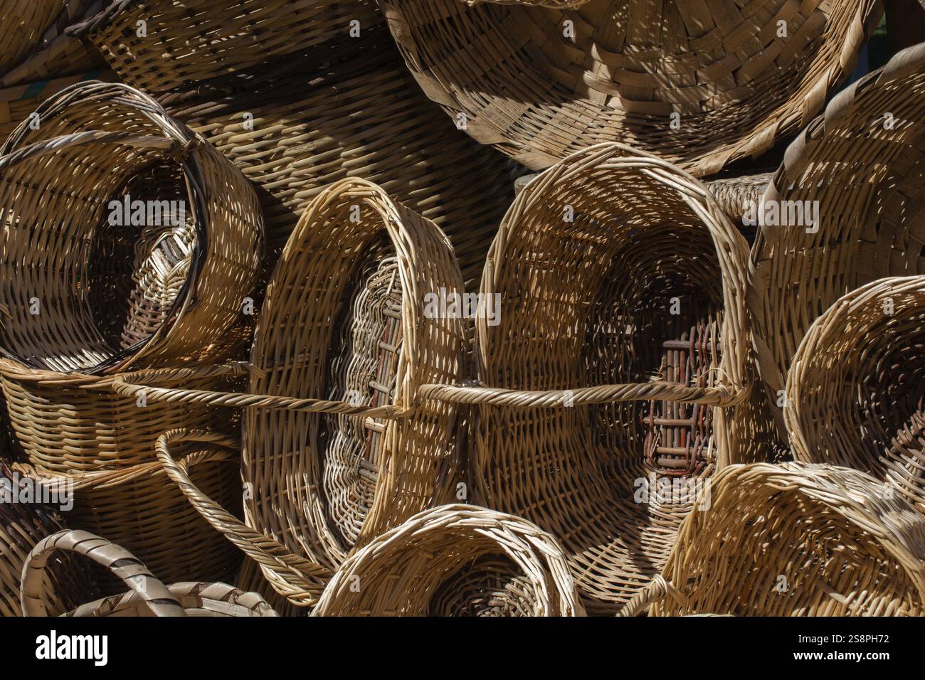 New wicker wicker baskets at the bazaar Stock Photo - Alamy