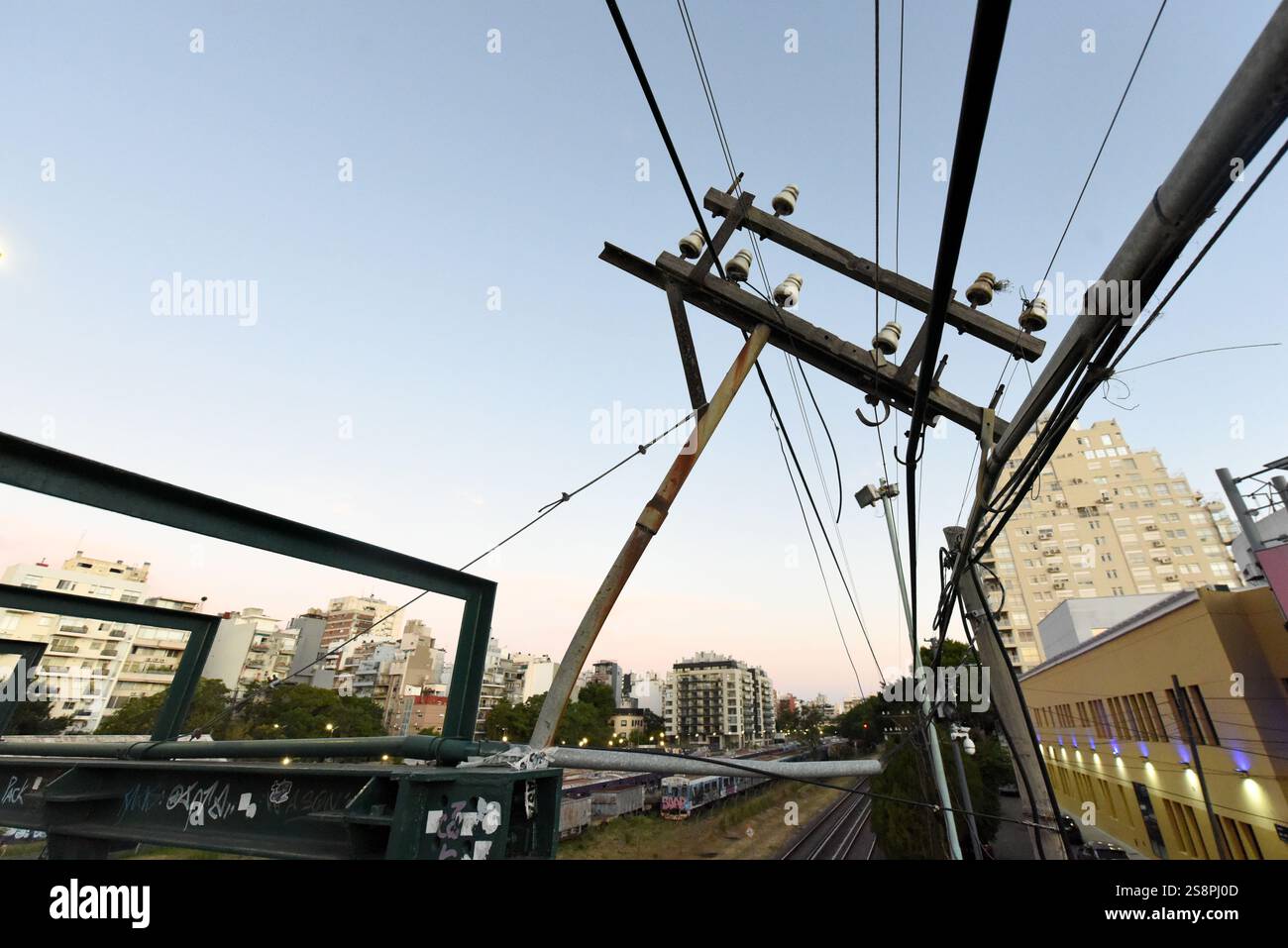 Old electric towers next to the train tracks in the city of Buenos ...
