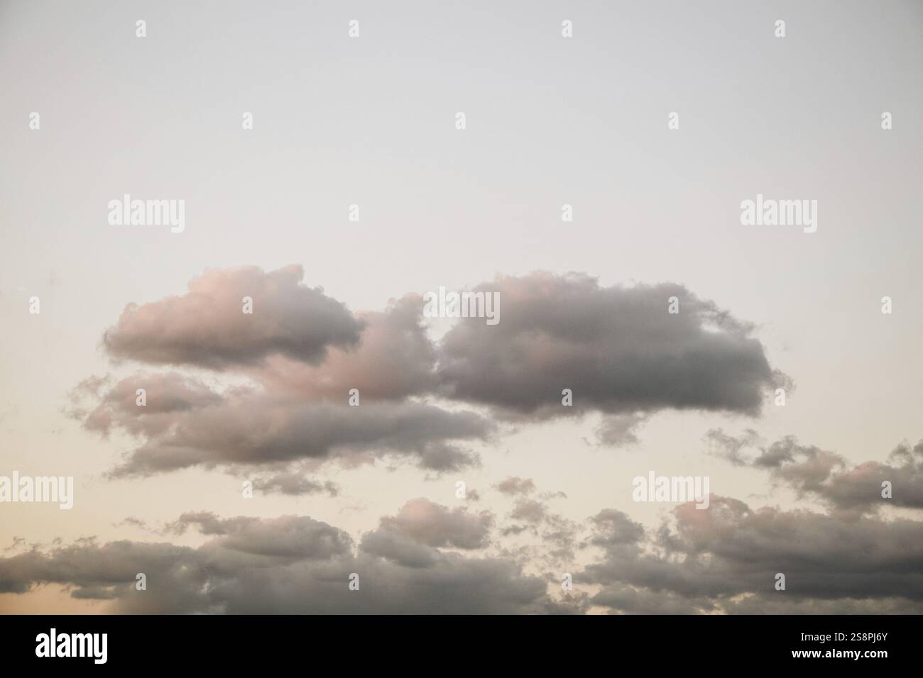 Grey color clouds partly cover the sky in the daytime Stock Photo - Alamy