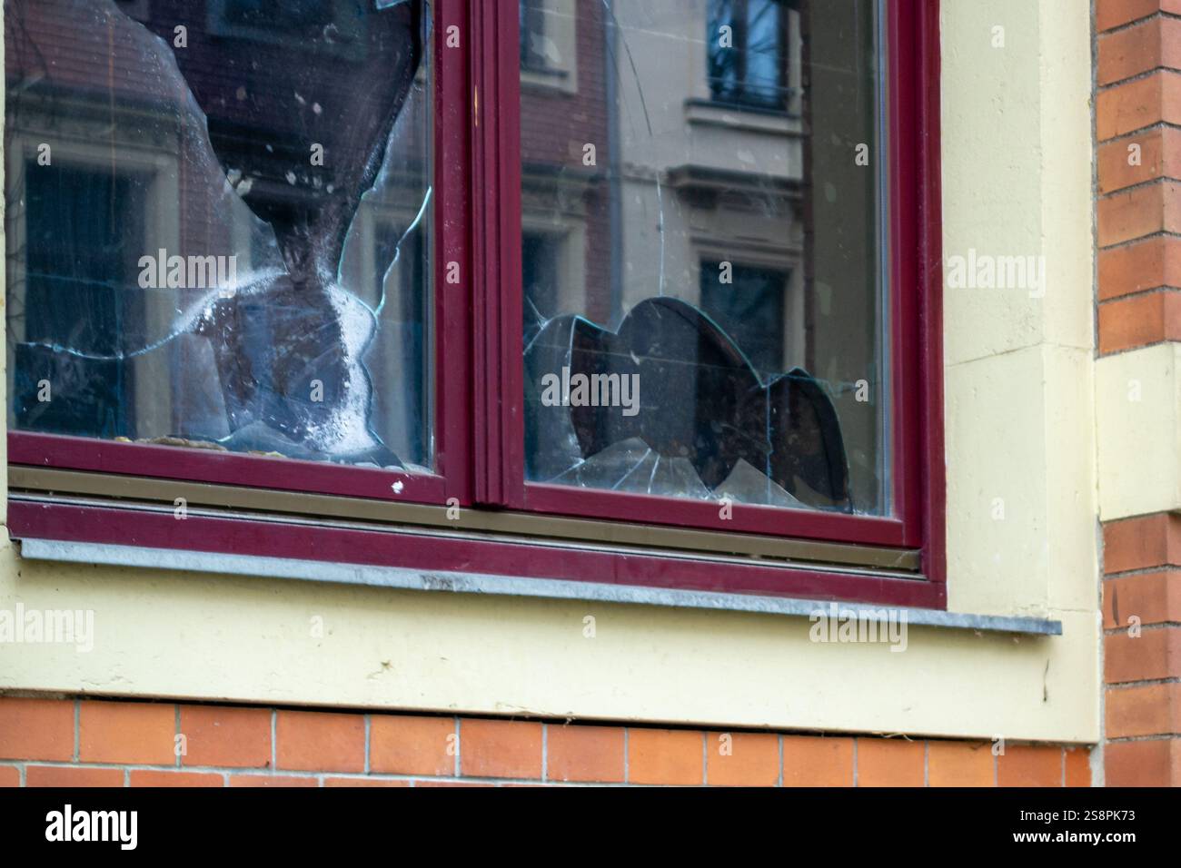 Window of an apartment smashed, vandalism symbols of burglars Stock ...