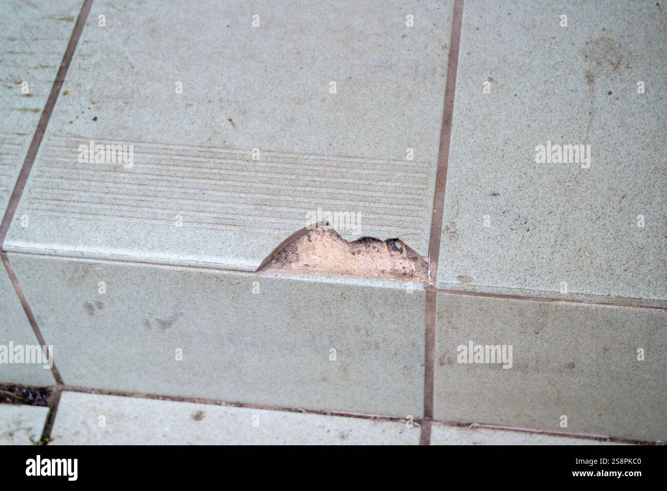 Broken tile of a staircase entrance door on the house construction ...