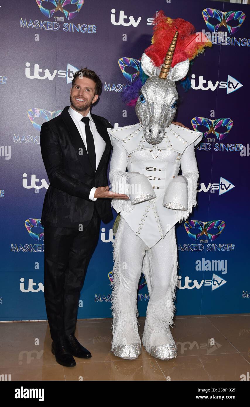 Joel Dommett attends The Masked Singer' TV Show Launch Photocall at The ...