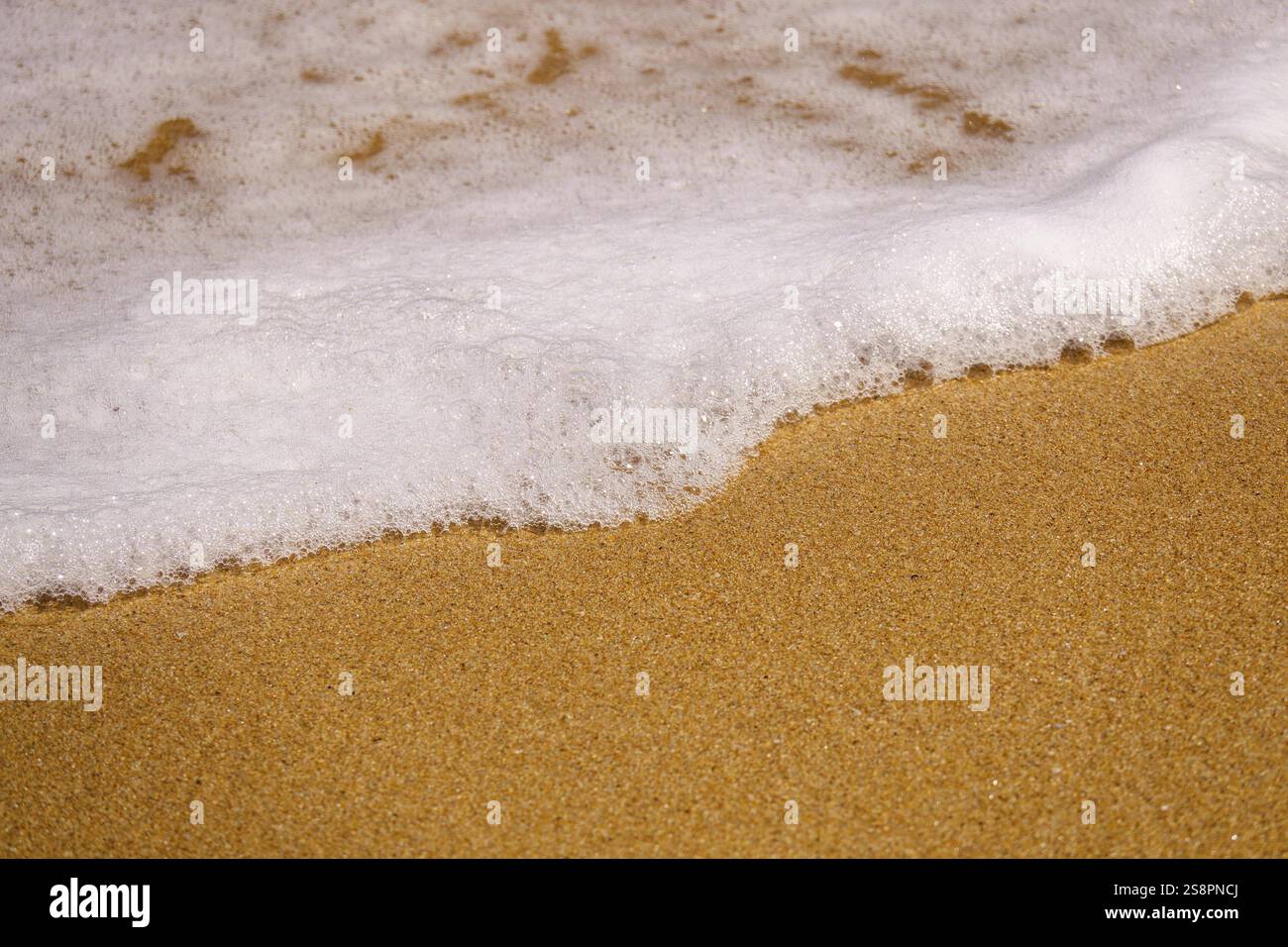 An image of a sandy beach shore line texture background Stock Photo - Alamy