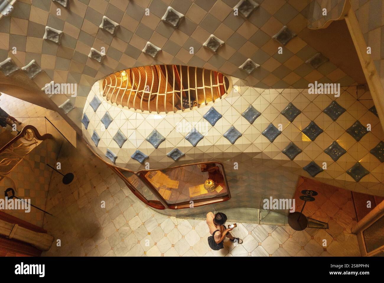High angle view of a tourist capturing the colorful ceramic tiles and ...