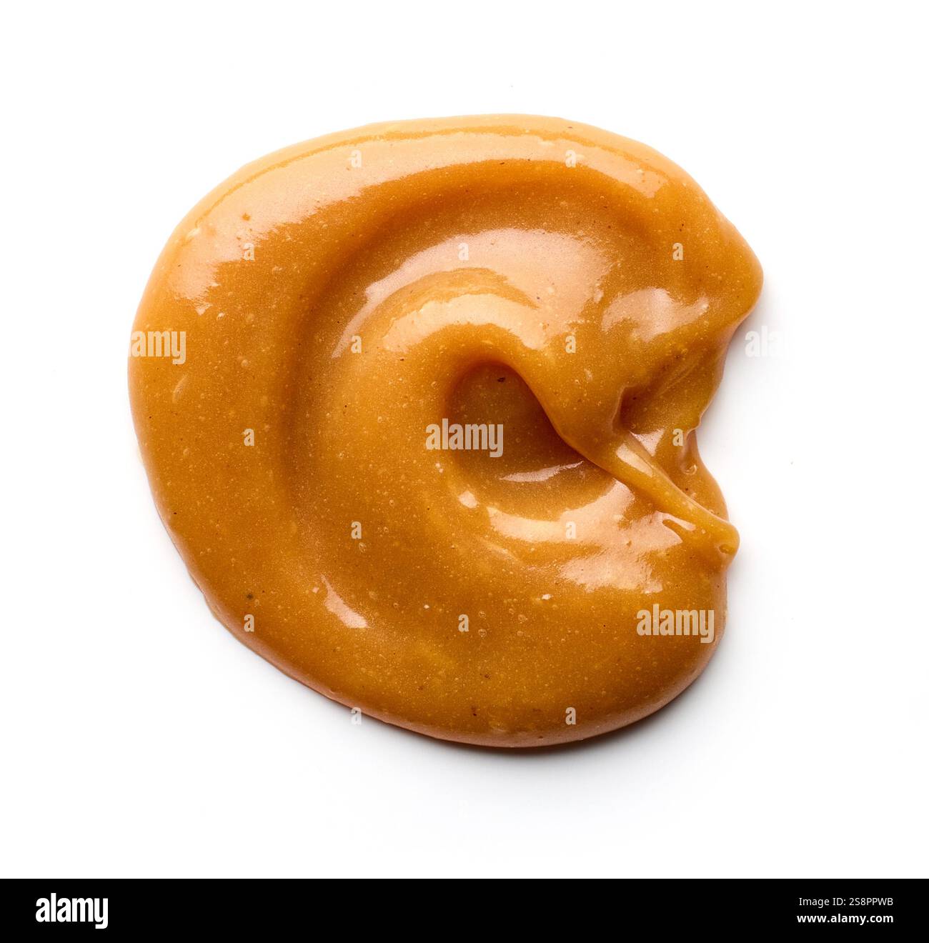 Smear of tasty caramel paste on white background, top view Stock Photo ...