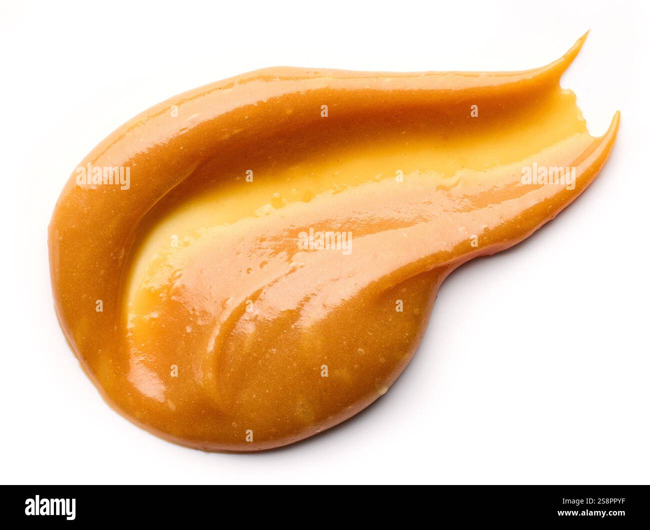 Smear of tasty caramel paste on white background, top view Stock Photo ...
