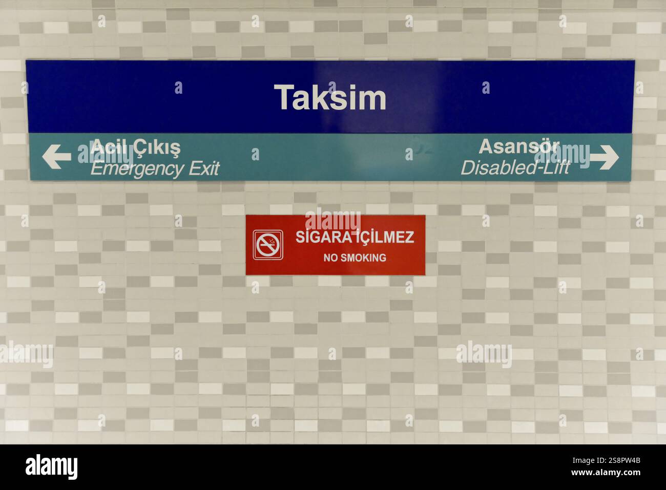 Metro sign for the exit of Taksim with information on emergency exit ...