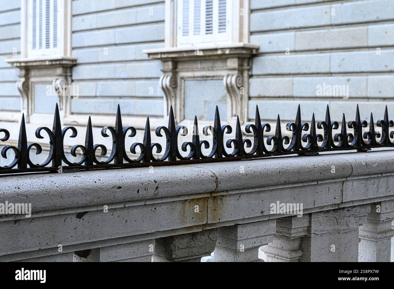 Metal protection spikes in a railing of the Royal Palace, Madrid, Spain ...