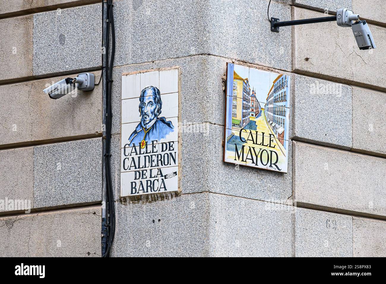 Street name signs made with tiles. Intersection of Calle Mayor and ...