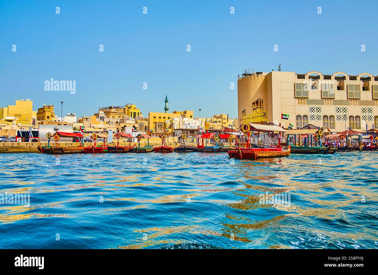 The abra boat station at the Deira bank of Dubai Creek in Dubai, UAE ...
