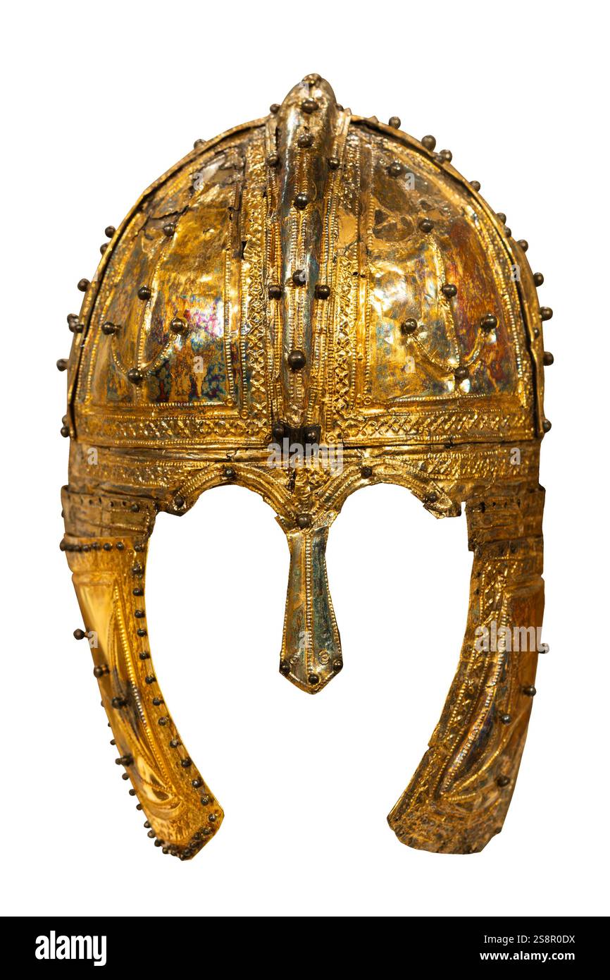 Golden helmet from medieval times featuring intricate details and ...