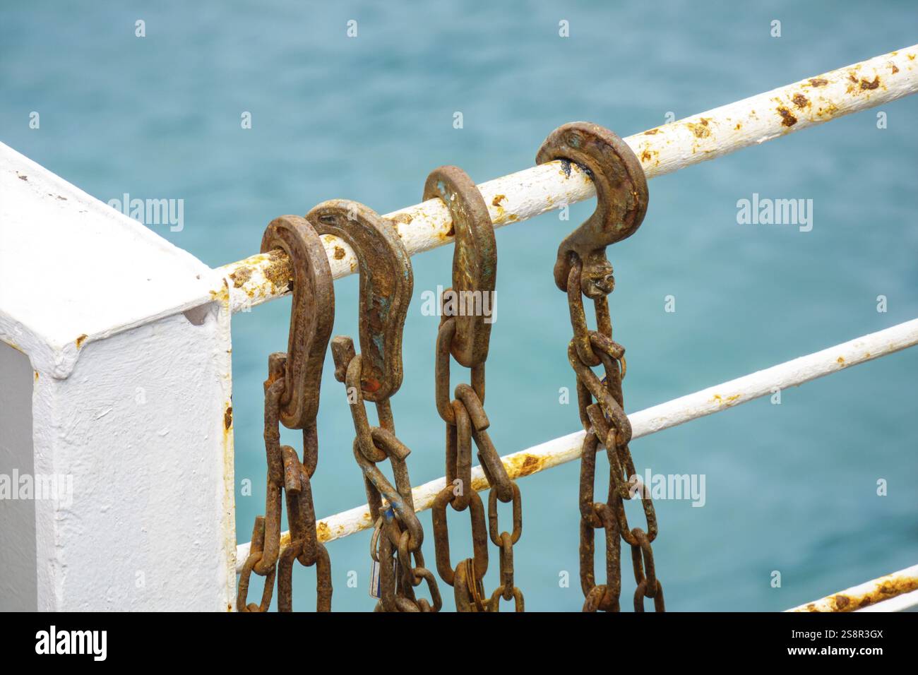 An image of some rusty hook at a ship Stock Photo - Alamy