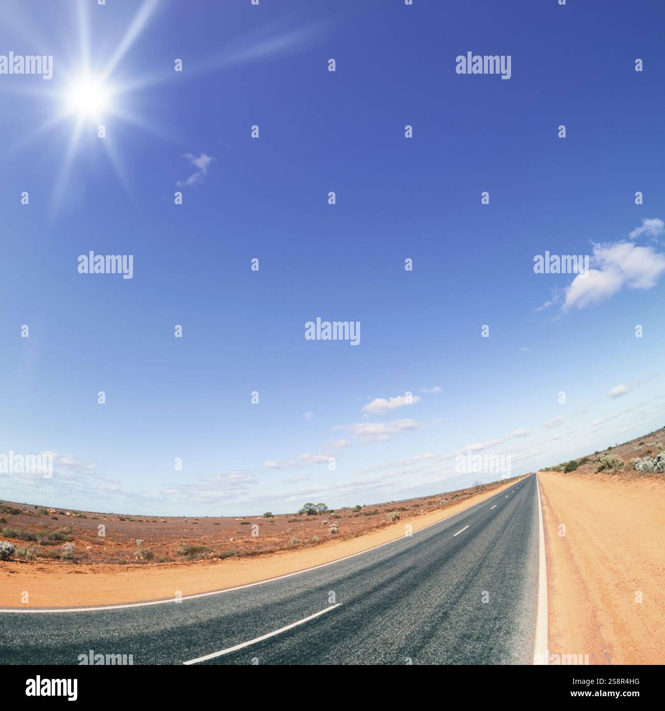 An image of a road in Australia with curved horizon Stock Photo - Alamy