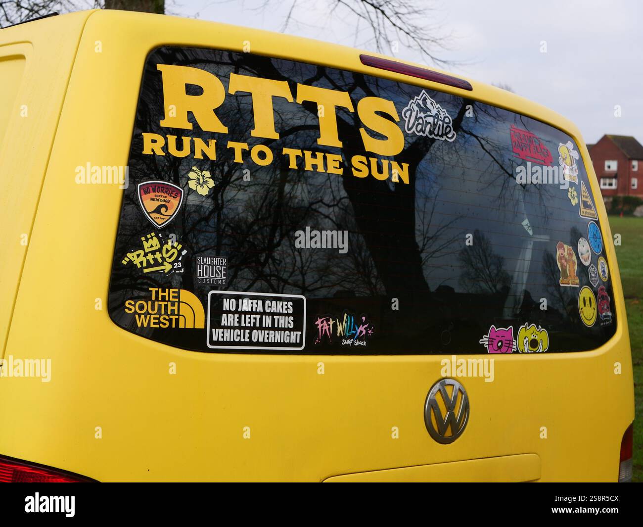 Stickers on the rear screen of a VW van. Devon, UK Stock Photo - Alamy