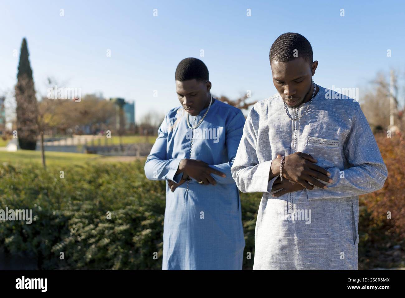 Two young senegalese muslim men wearing traditional dashiki clothing ...