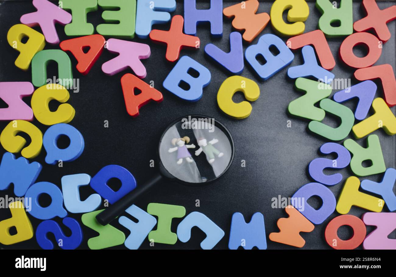Kids under Magnifying glass and Colorful Letters of Alphabet Stock ...