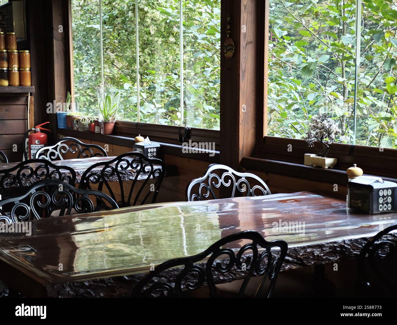 Rize, Trabzon, Turkey - November 15,2024: A dining area with a wooden ...