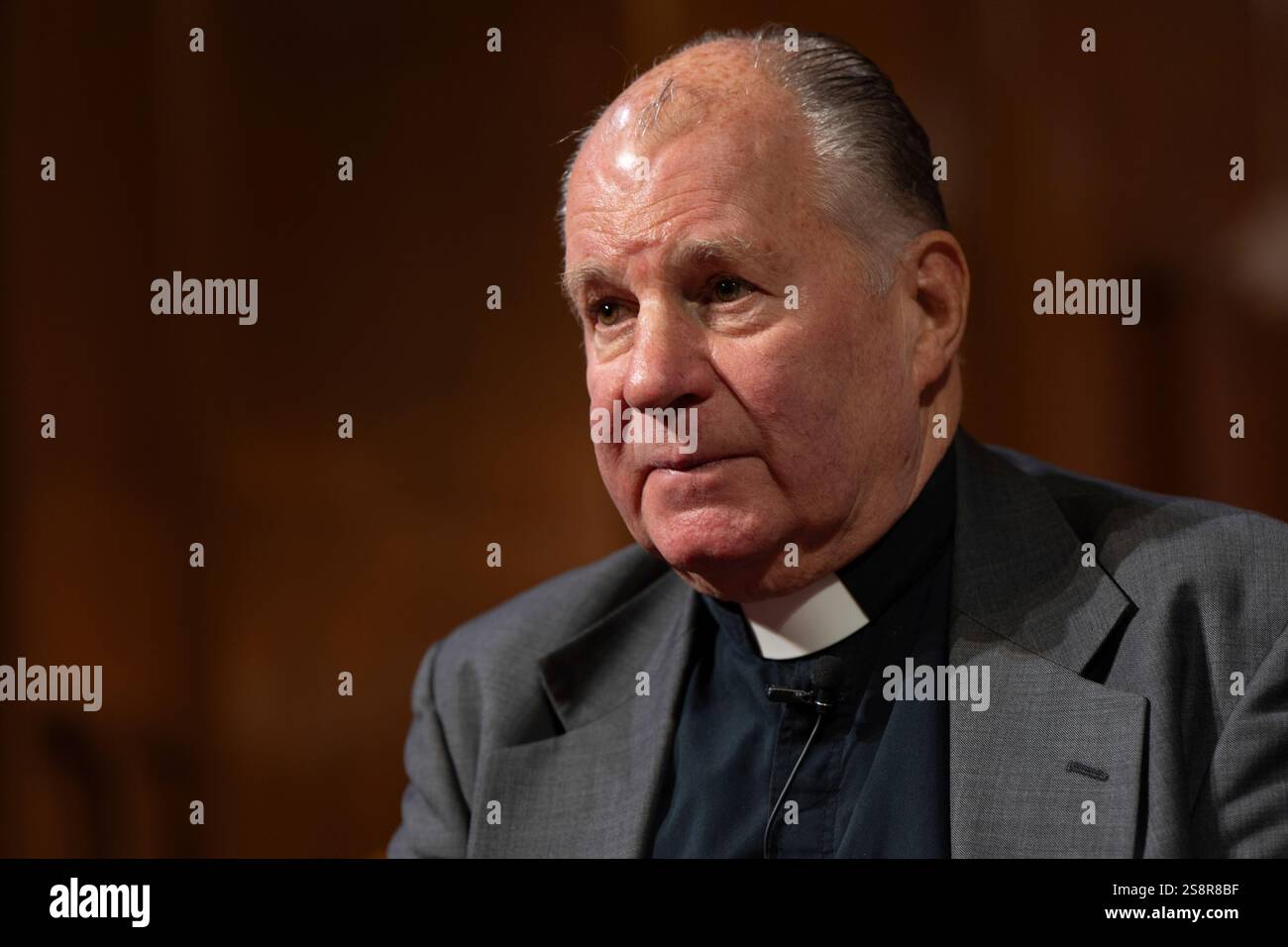 Rev. W. J. Mark Knutson gives an interview at the Augustana Lutheran ...