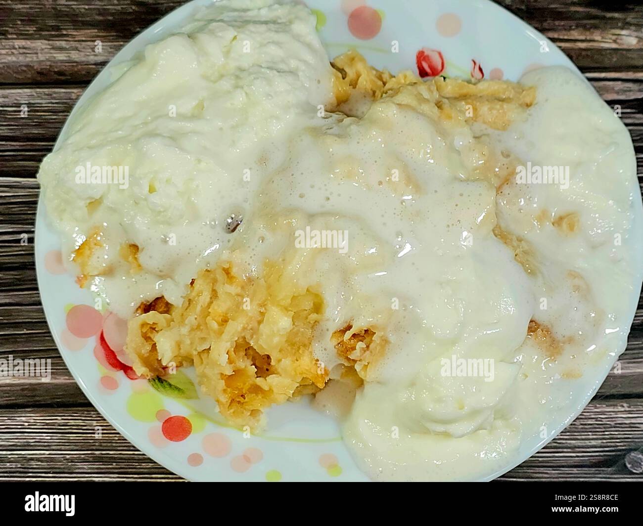 Whipped cream on top of Traditional Arabic Egyptian Eastern dessert ...