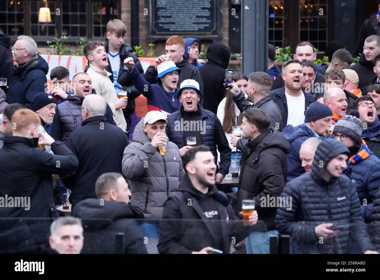 Rangers fans in the beer garden of the Old Wellington pub in Manchester ...