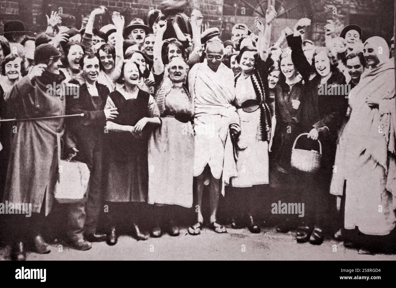 Gandhi with mill workers in Darwen, Lancashire in 1931, during his tour ...