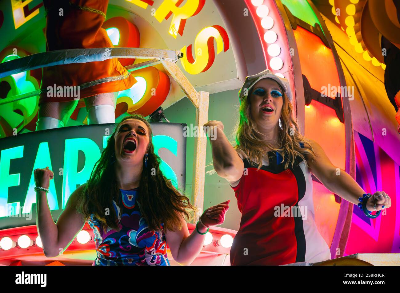 Glastonbury, UK - November 16th 2024: Dancing girls on a colorful ...