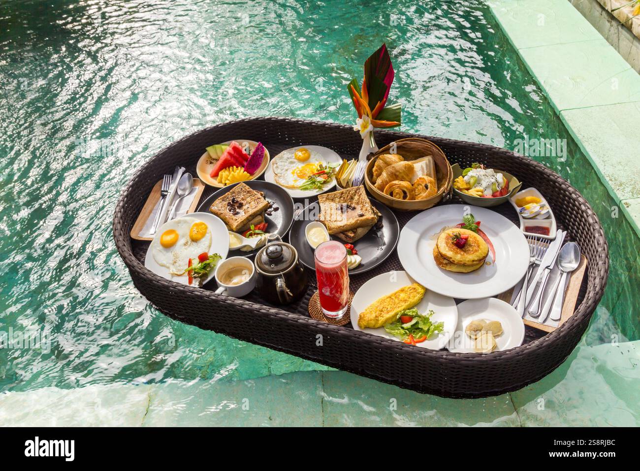 Floating breakfast in a swimming pool Stock Photo - Alamy
