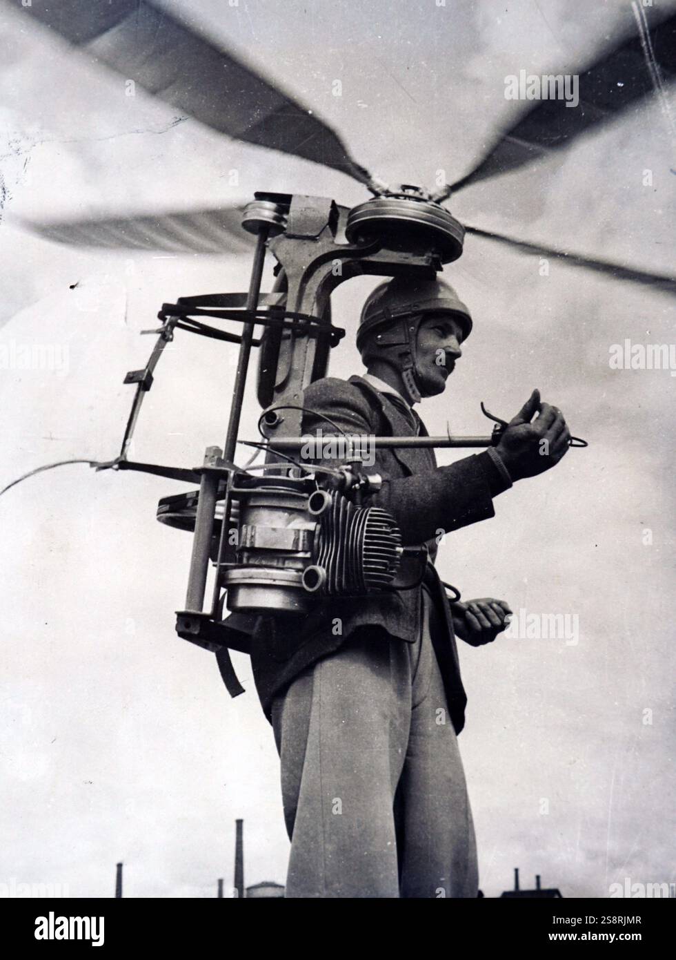 Photograph of Georges Sablier demonstrating his latest invention, a ...