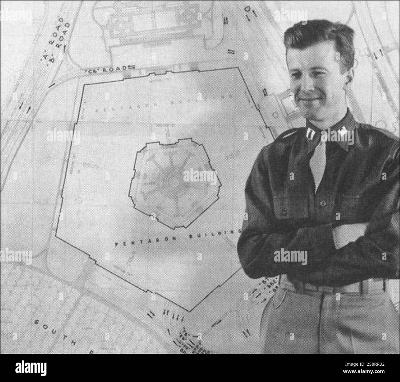Robert R. Furman with the Pentagon layout, later built in 1943. Robert ...
