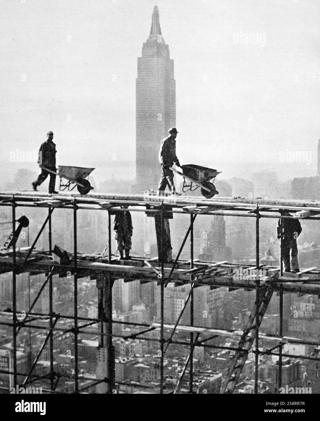 Construction workers on the 39th storey of the United Nations ...
