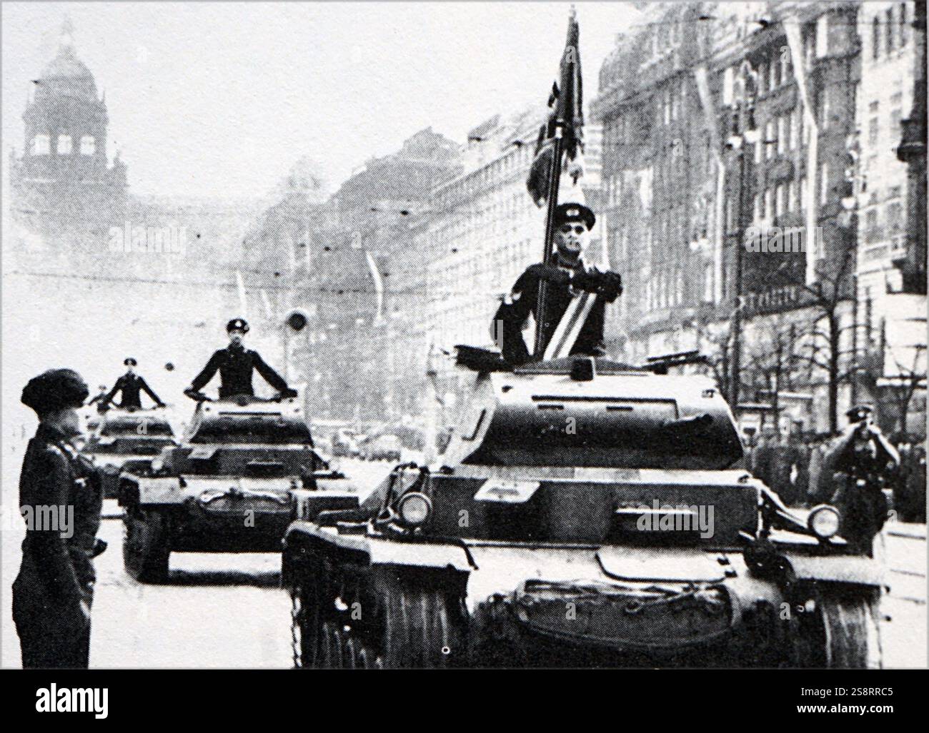 German tanks and army passing the streets of Prague, Czechoslovakia in 1939 at the start of ...