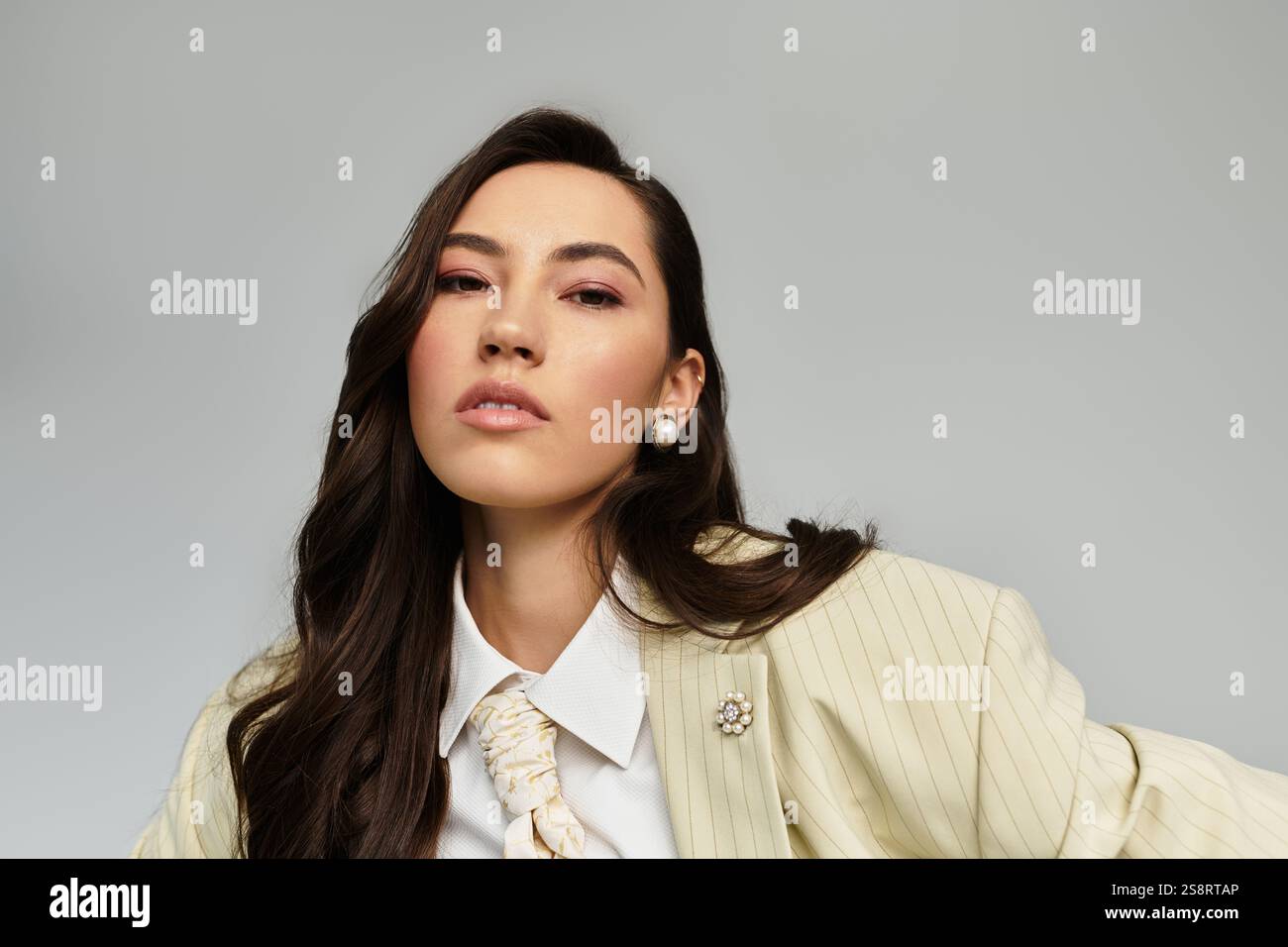 Confident young woman shines in her chic outfit, showcasing her ...