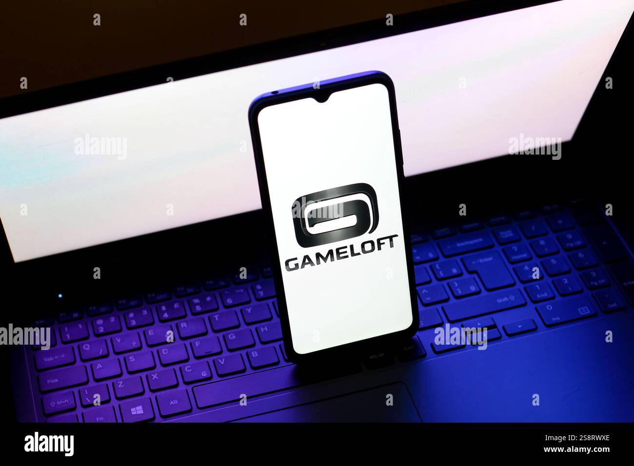 In this photo illustration, the Gameloft logo is seen displayed on a ...